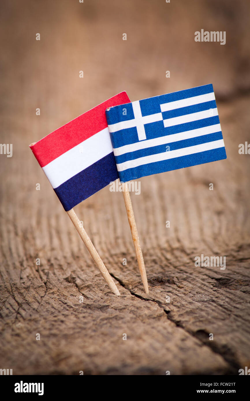 Flags of Netherlands and Greece on wooden background Stock Photo - Alamy