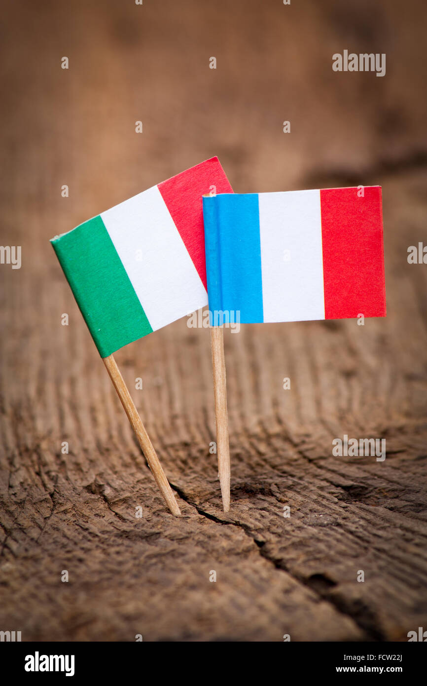 Flags of Italy and France on wooden background Stock Photo - Alamy