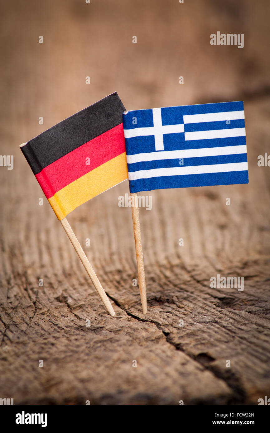 Flags of Germany and Greece on wooden background Stock Photo - Alamy