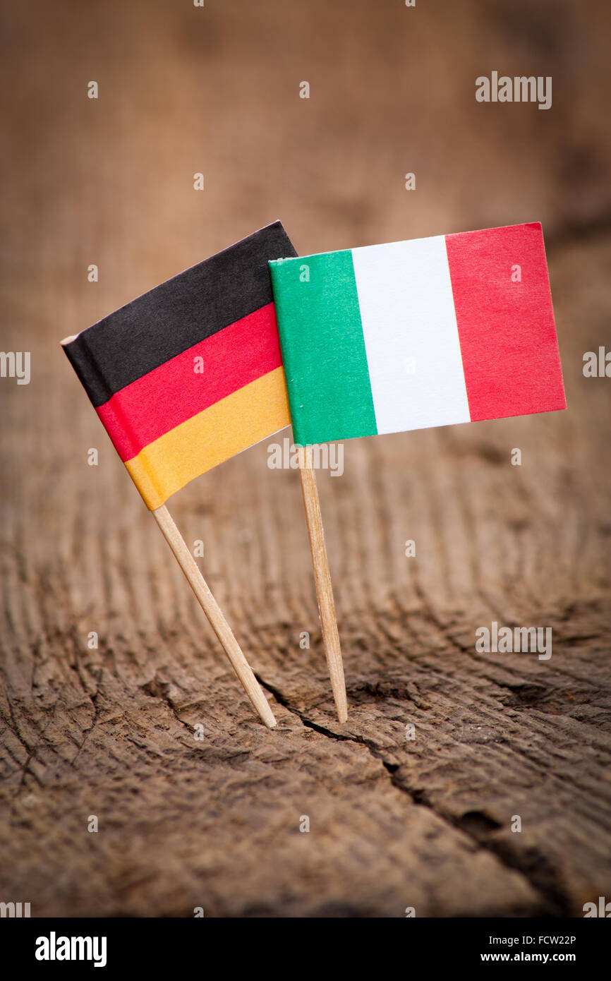 Flags of Italy and Germany on wooden background Stock Photo - Alamy