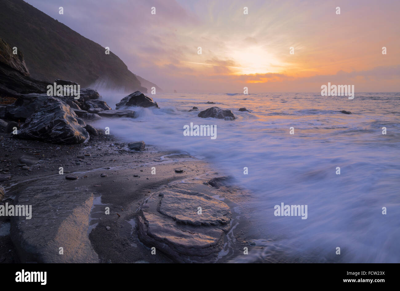A new dawn over Downderry Beach in East Cornwall Stock Photo - Alamy