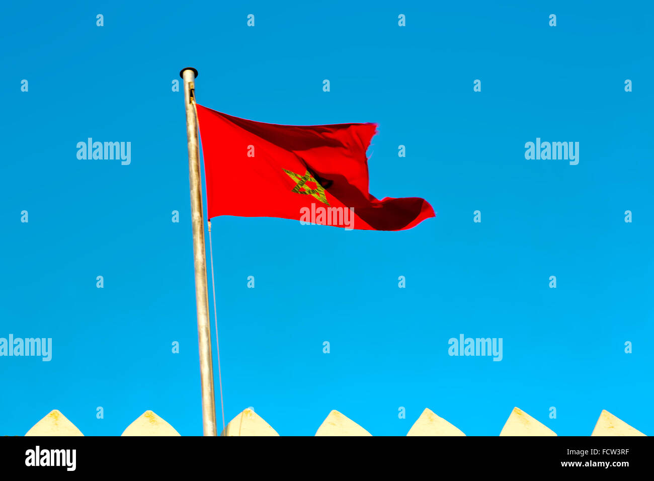 waving flag in the blue sky tunisia colour and wave battlements Stock ...