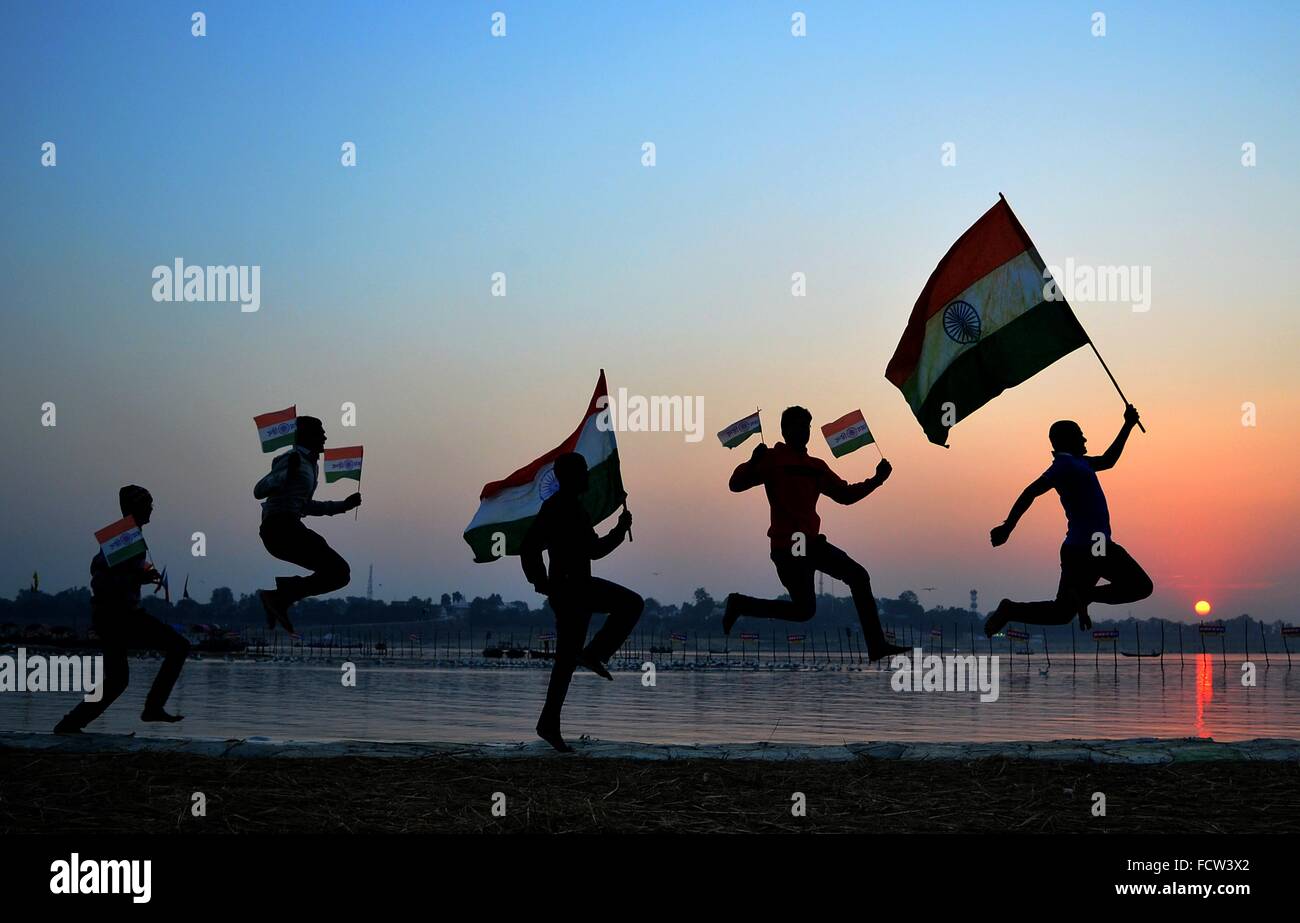 Allahabad, Uttar Pradesh, India. 25th Jan, 2016. Indian youth run with ...