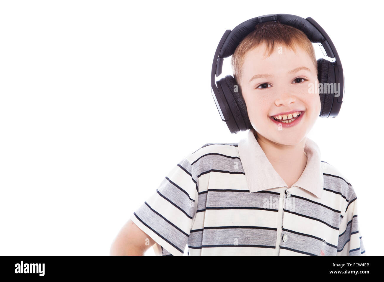 The young boy listening to music Stock Photo - Alamy