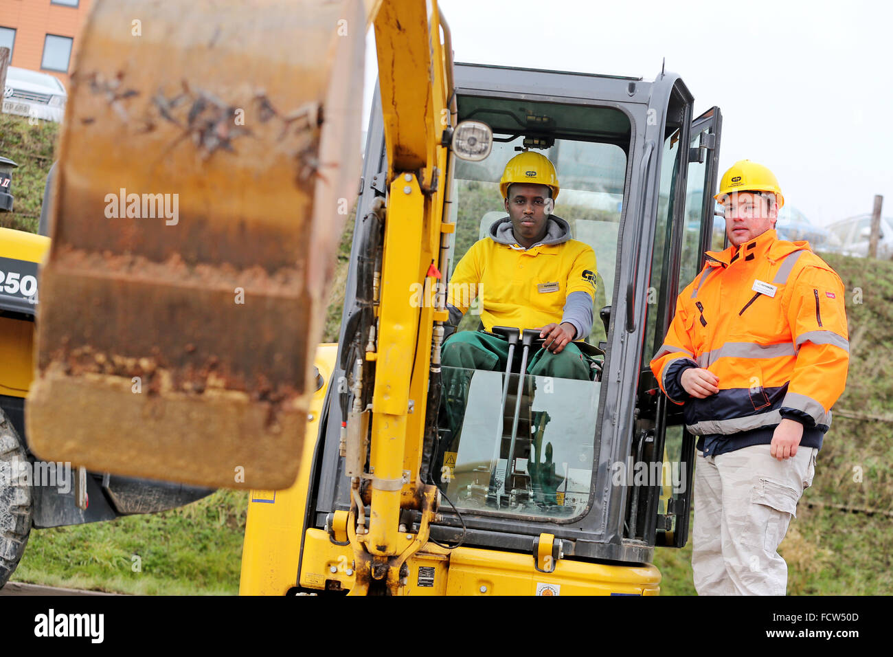 Maximilian Giersch (R) explains to future apprentice Ayanie Osman Hosh ...