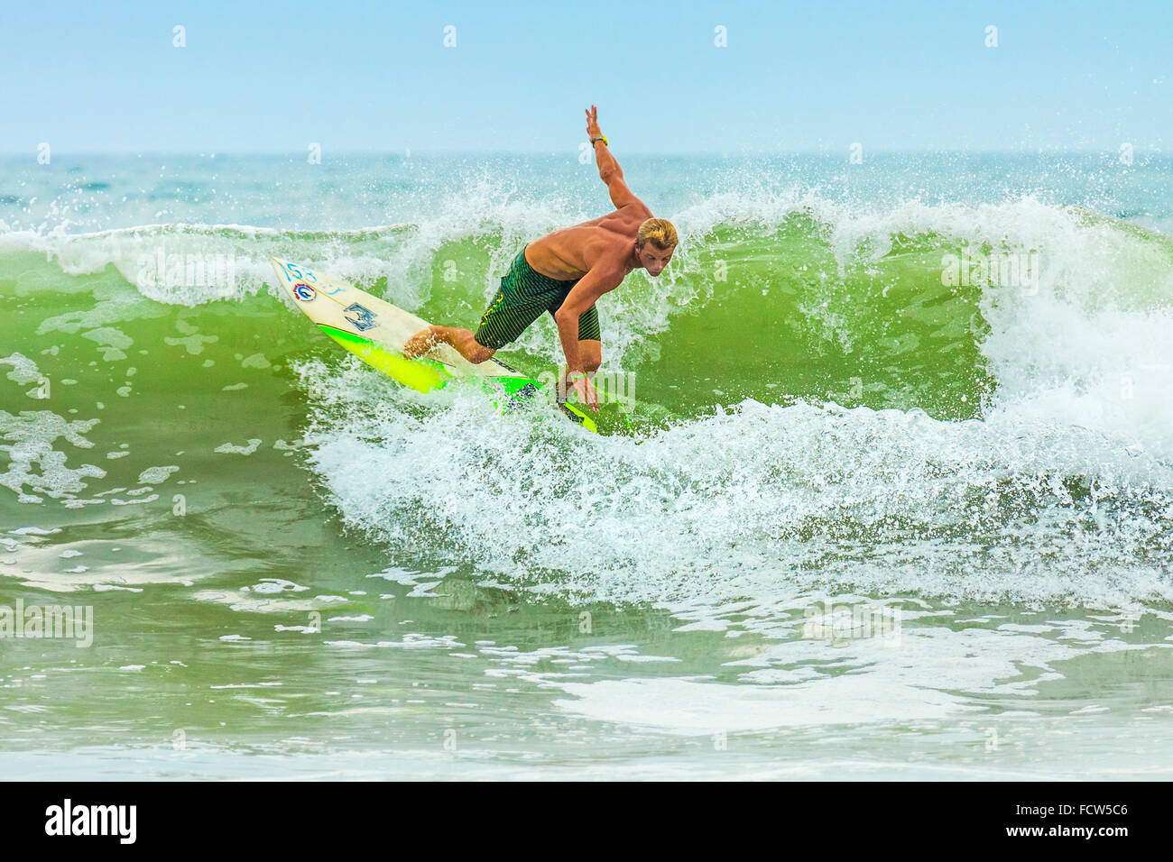 Shortboard surfer riding a wave at this surf resort on the south coast ...