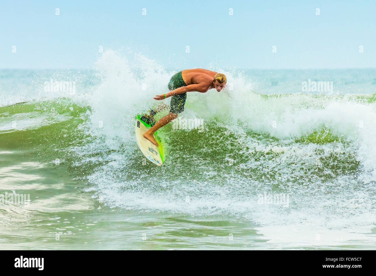 Shortboard surfer riding a wave at this surf resort on the south coast ...