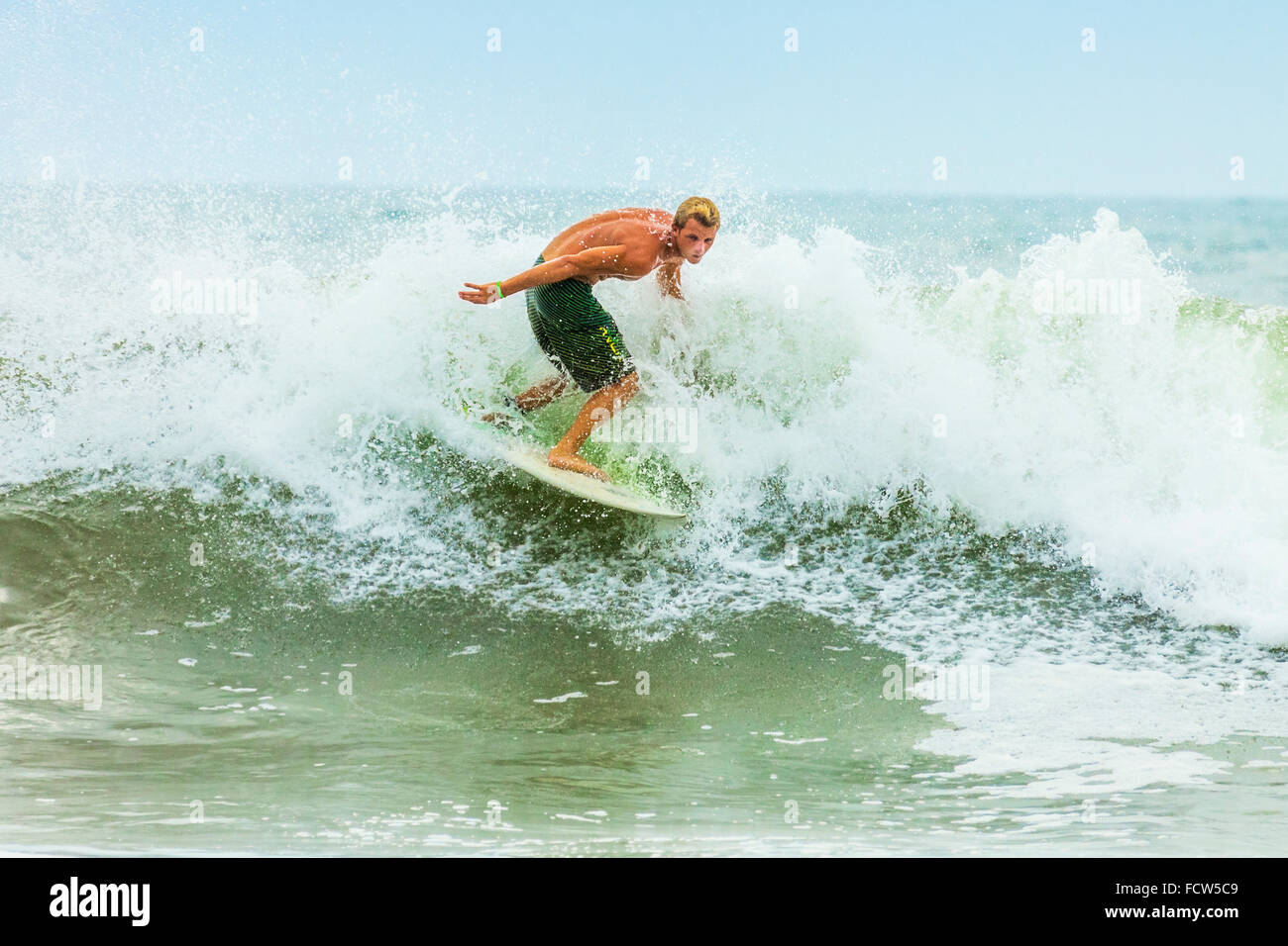 Shortboard surfer riding a wave at this surf resort on the south coast ...