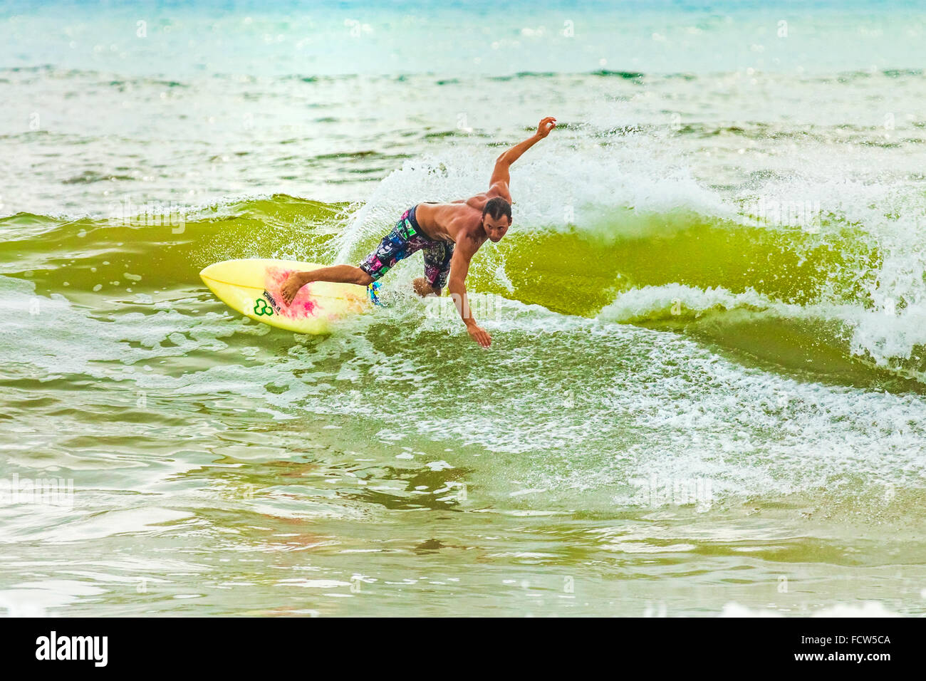 Shortboard surfer riding a wave at this surf resort on the south coast ...