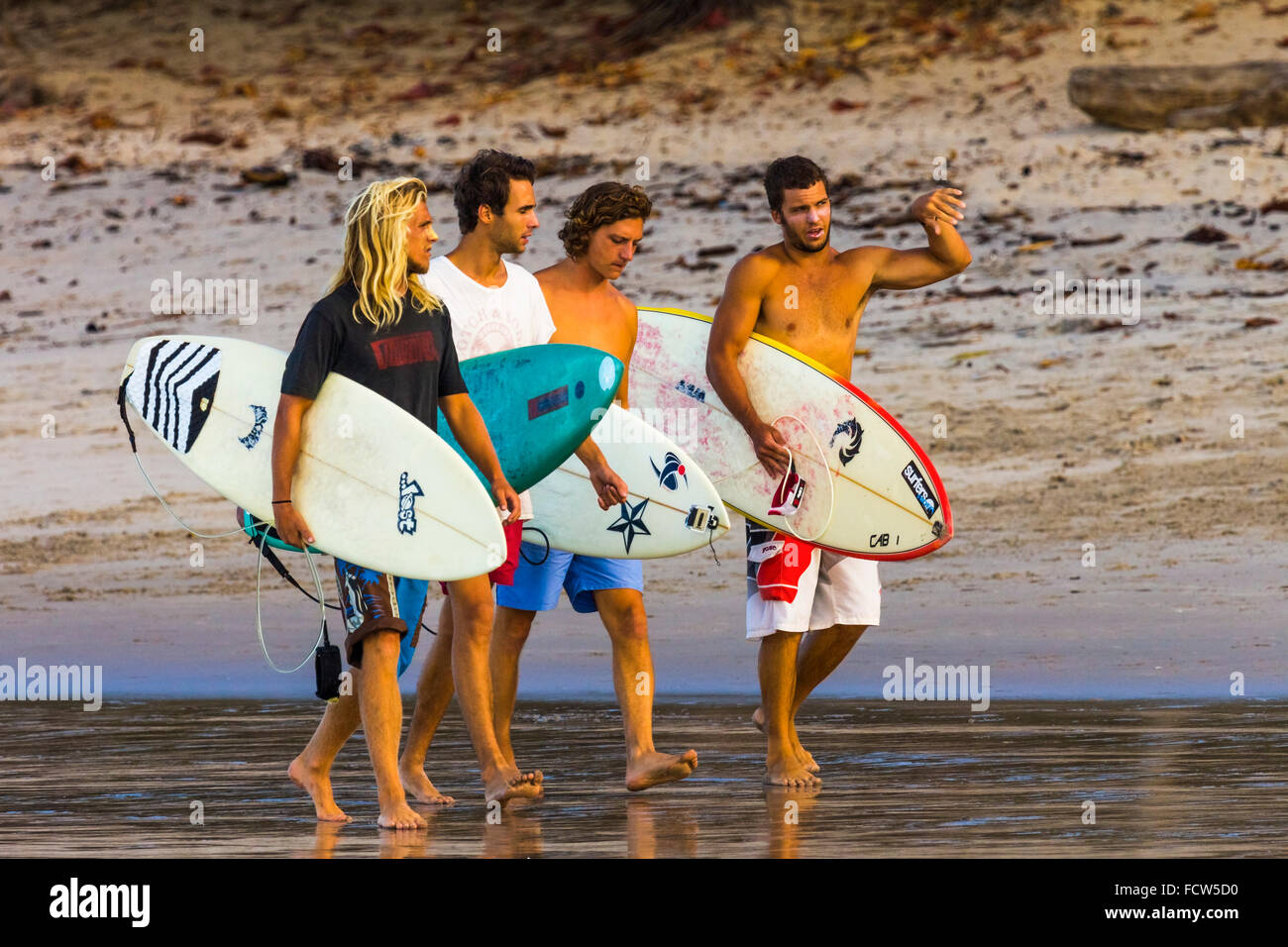 Shortboard surfers chatting at this hip southern Nicoya Peninsula surf ...