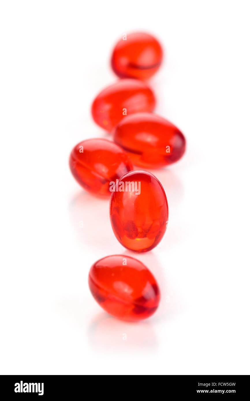 Closeup shot of red capsules Stock Photo - Alamy