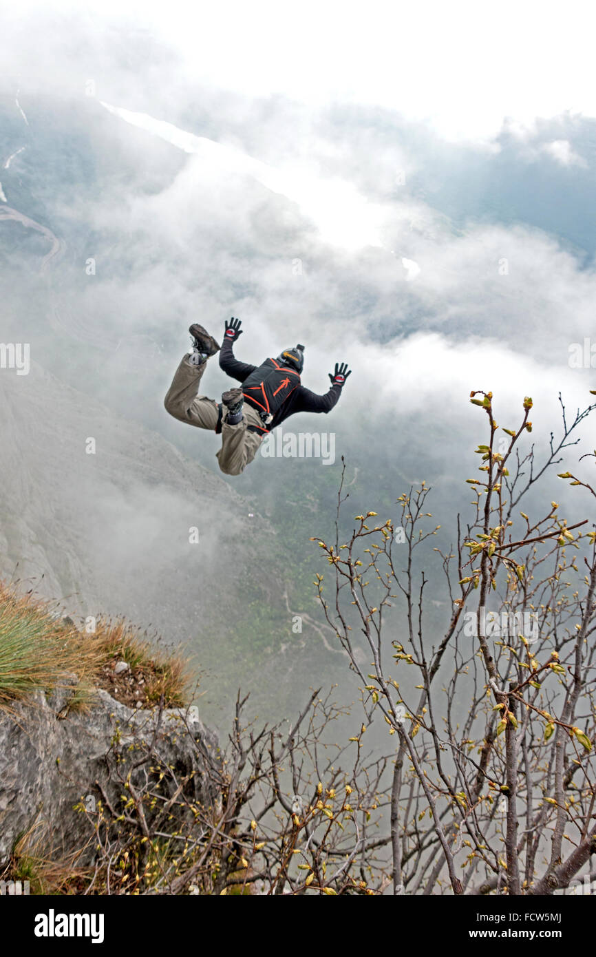 Man falling cliff edge hi-res stock photography and images - Alamy