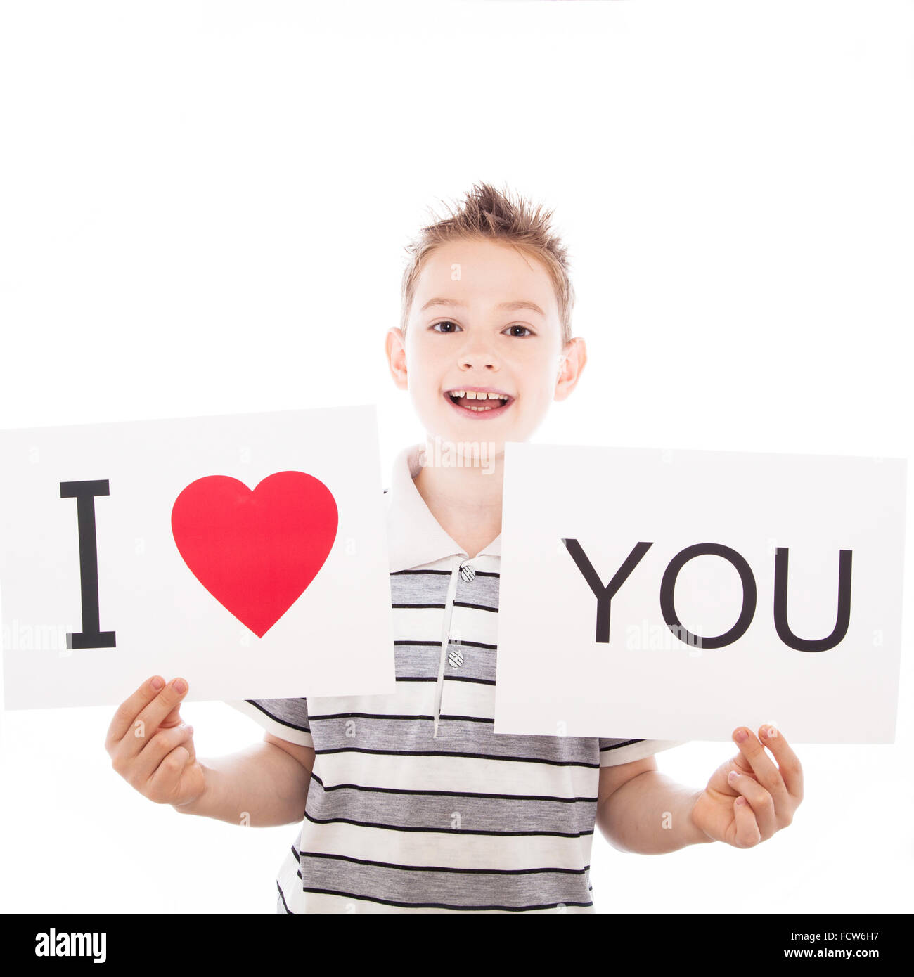 Happy boy with sign Stock Photo - Alamy