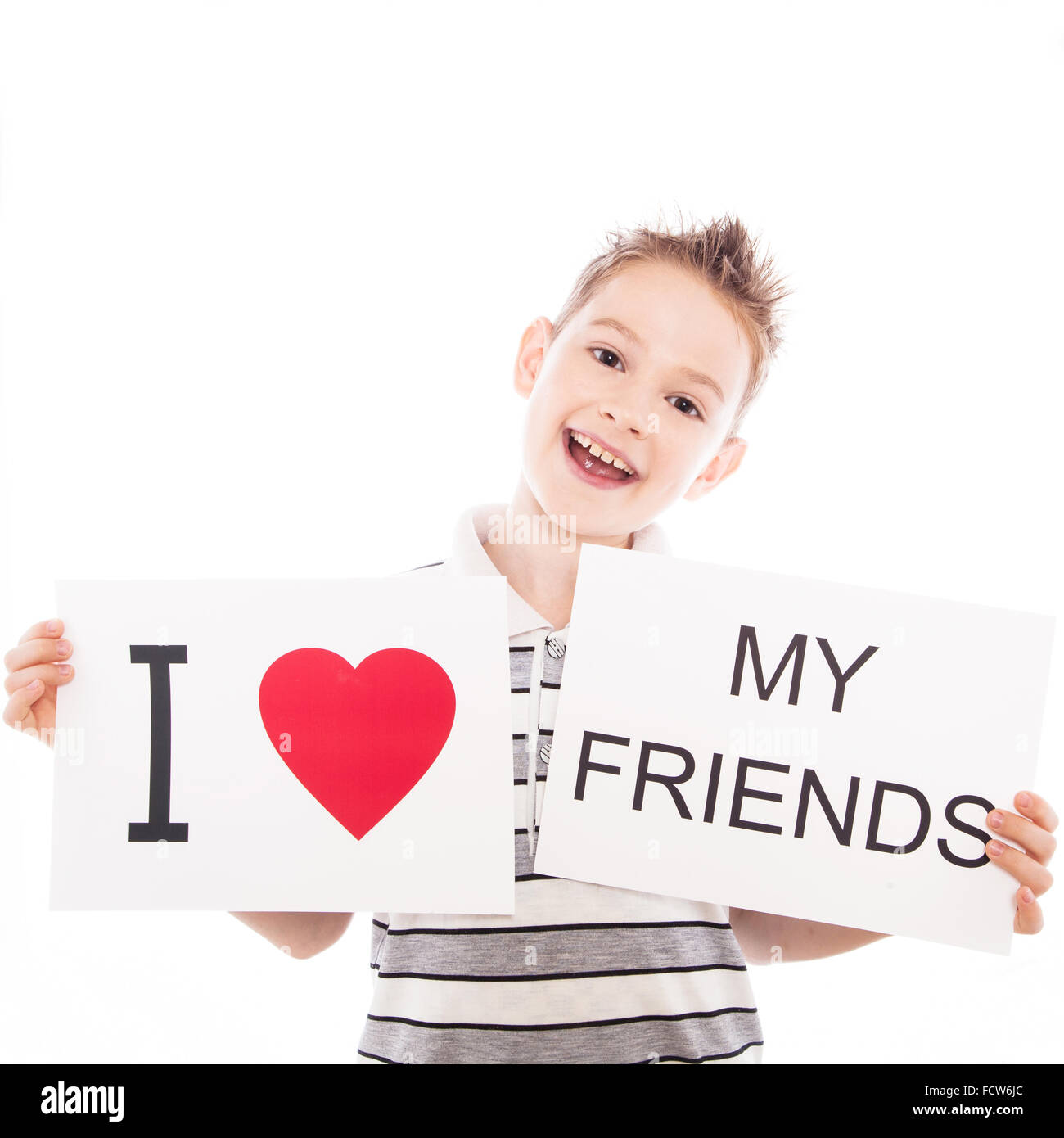 Happy boy with sign Stock Photo - Alamy