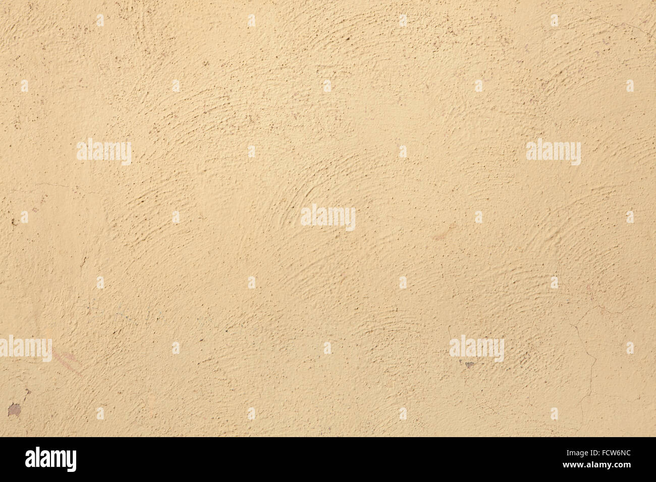 Yellow stucco wall. Background texture Stock Photo - Alamy
