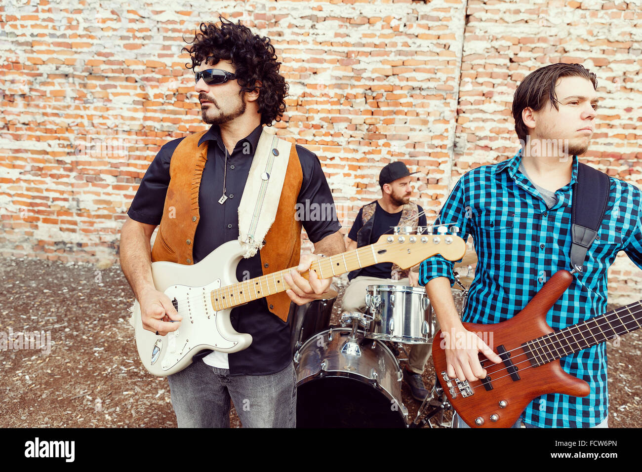 Band of musicians playing in the street Stock Photo - Alamy