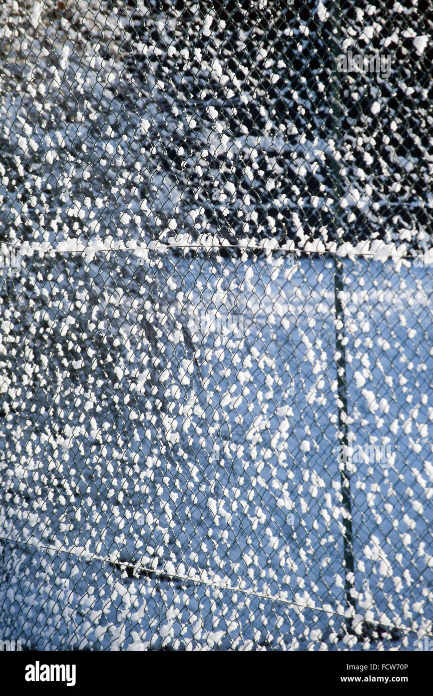 Snow covered tennis court Stock Photo - Alamy
