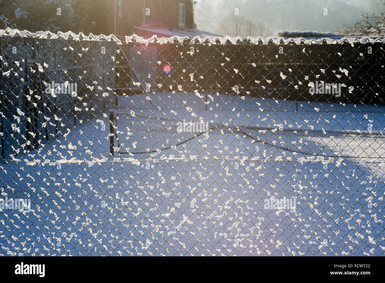 Snow covered tennis court Stock Photo - Alamy