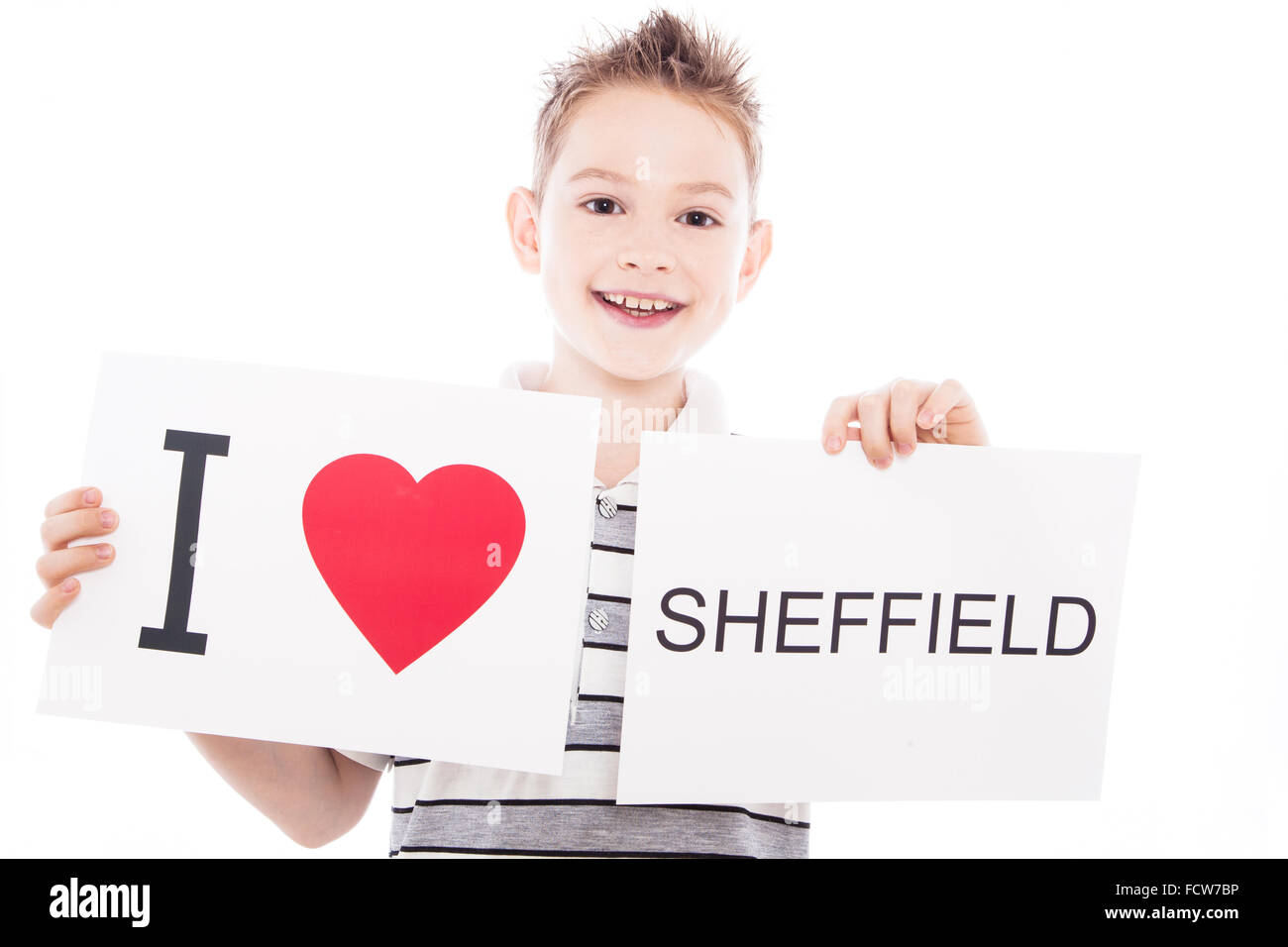 Boy with city sign Stock Photo - Alamy