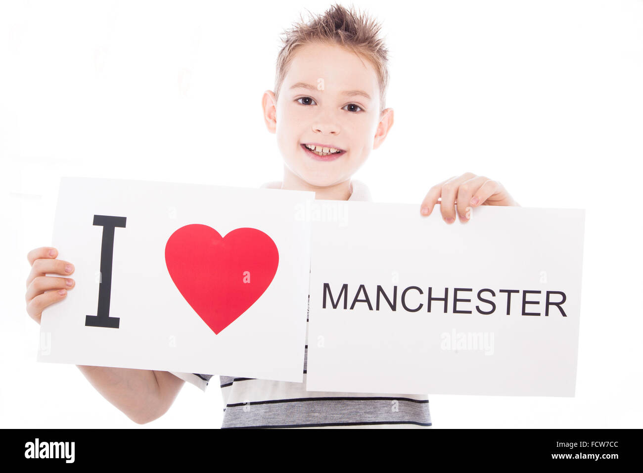 Boy with city sign Stock Photo - Alamy
