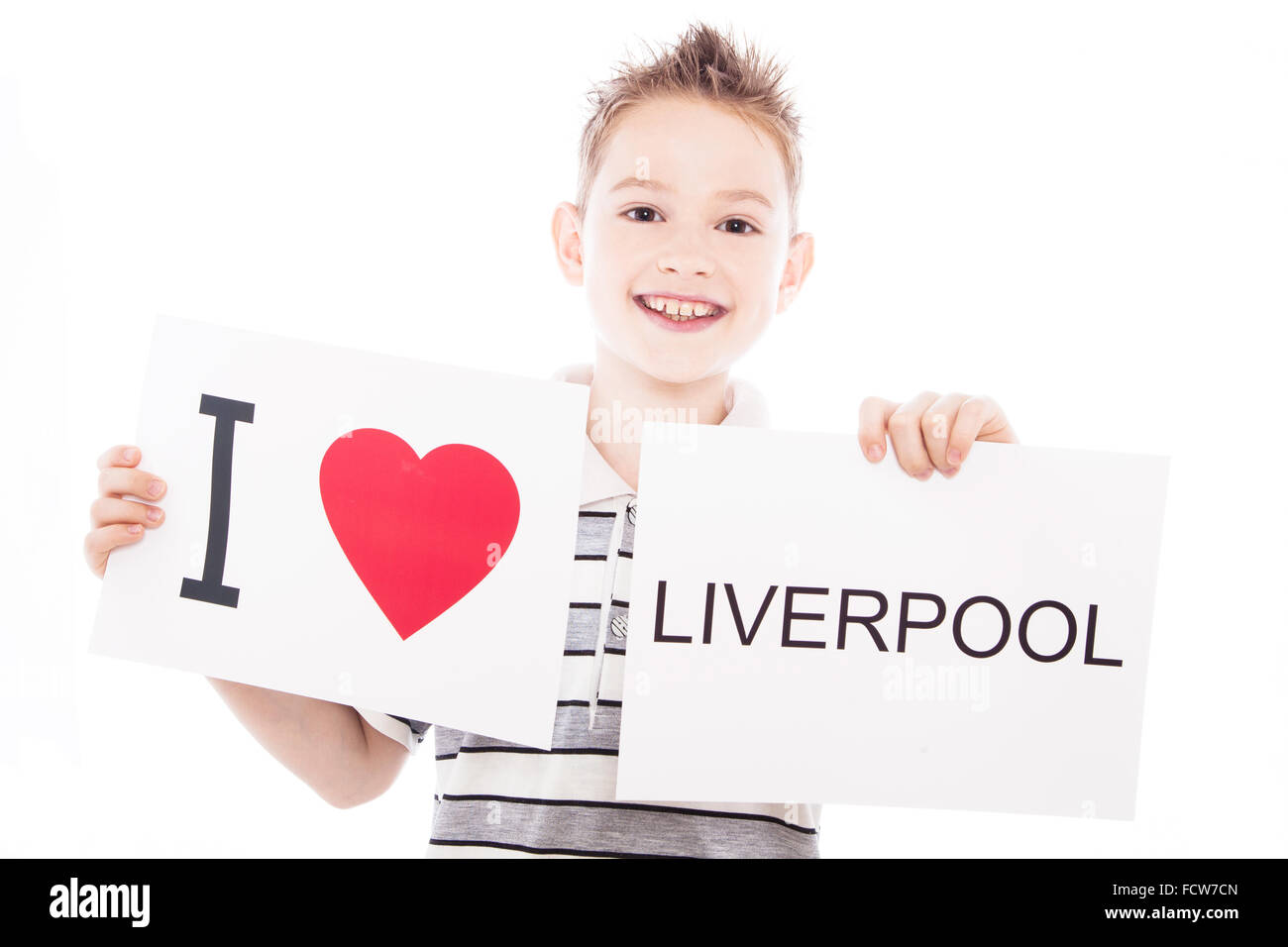 Boy with Liverpool city sign Stock Photo - Alamy