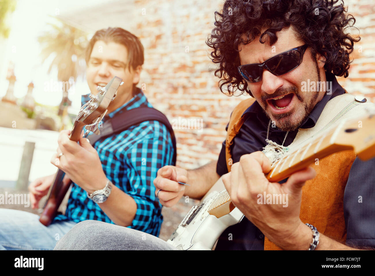 Band of musicians playing in the street Stock Photo - Alamy