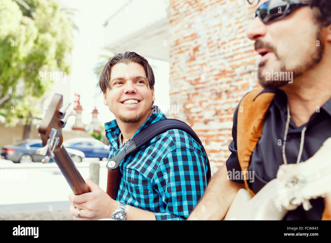 Band of musicians playing in the street Stock Photo - Alamy