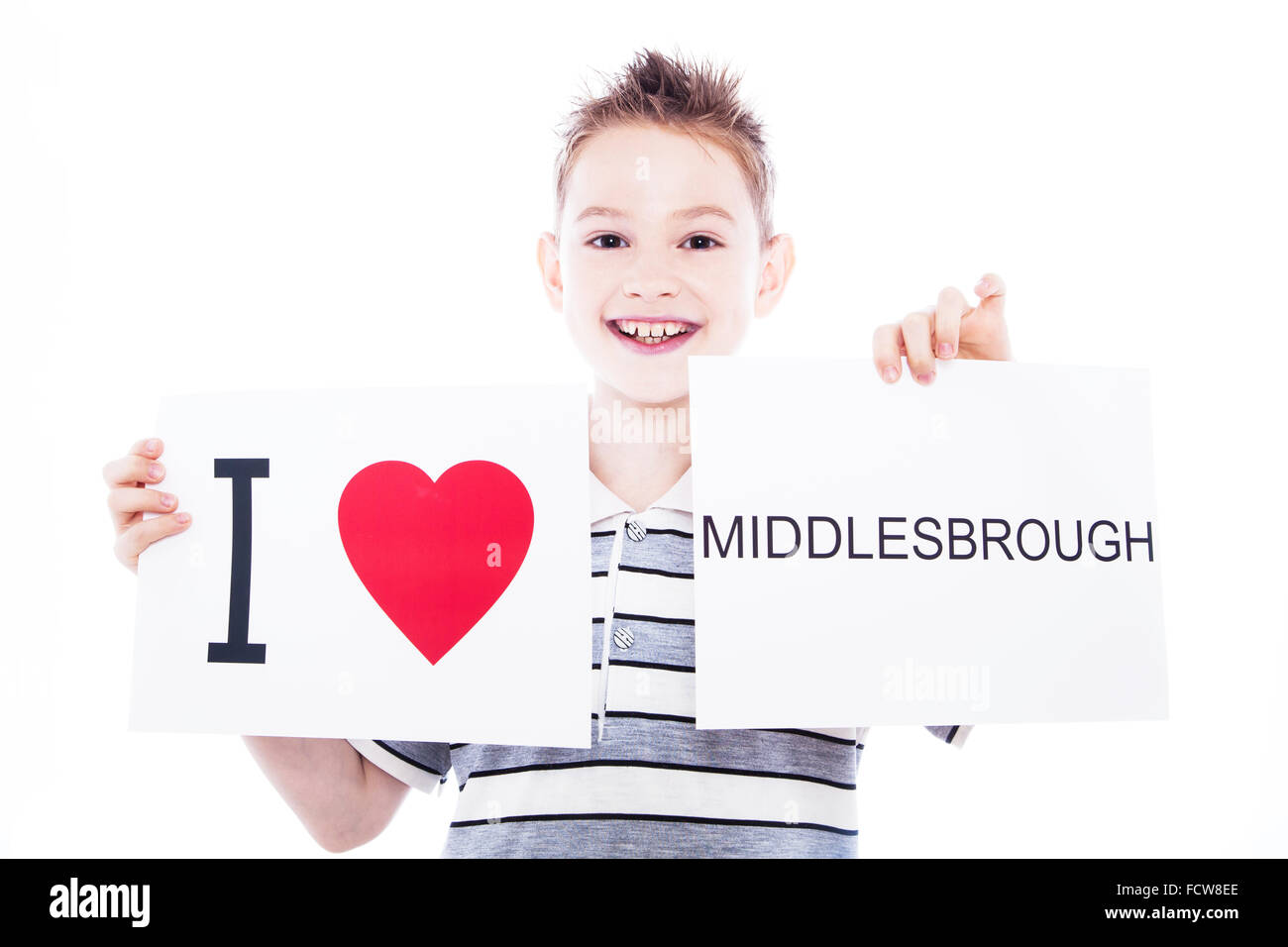 Boy with Middlesbrough city sign Stock Photo - Alamy