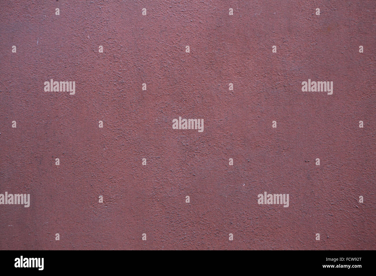 Burgundy red painted stucco wall. Background texture Stock Photo - Alamy