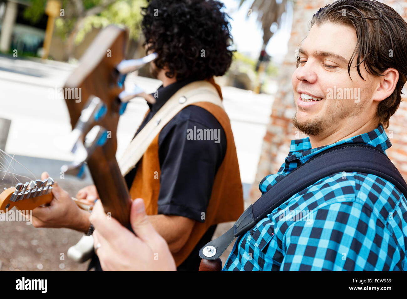 Band of musicians playing in the street Stock Photo - Alamy