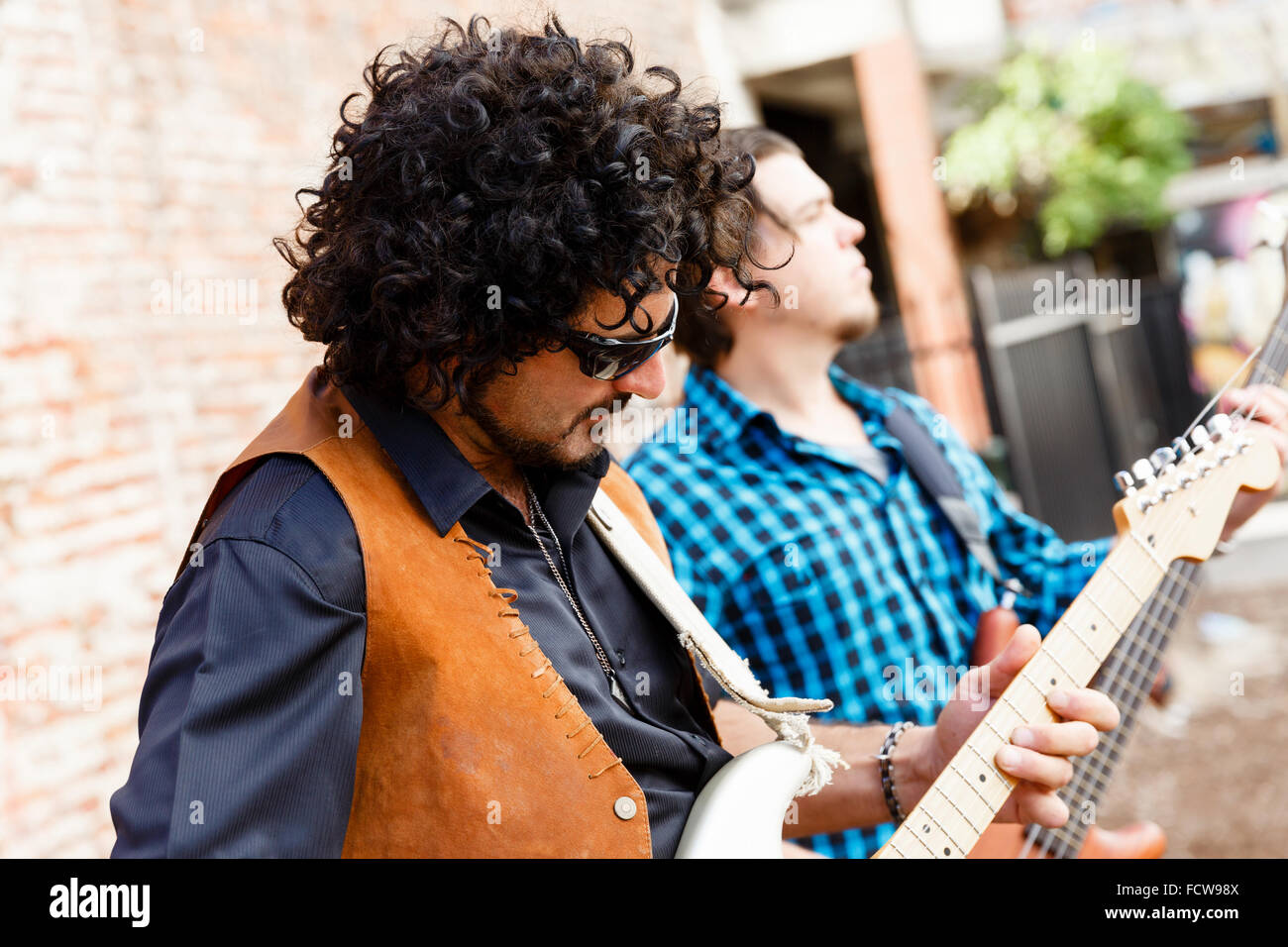 Band of musicians playing in the street Stock Photo - Alamy
