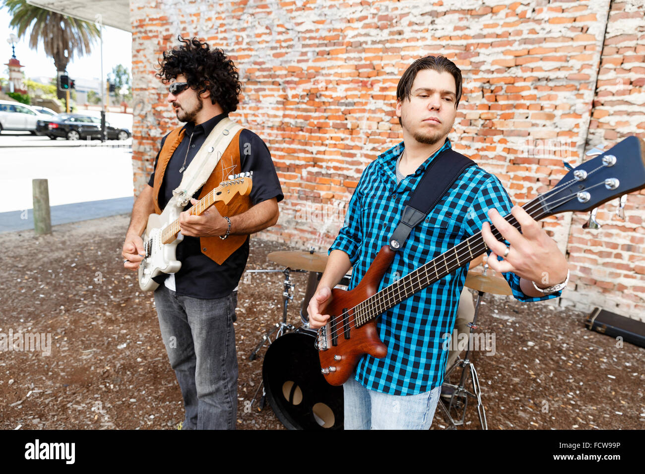Band of musicians playing in the street Stock Photo - Alamy