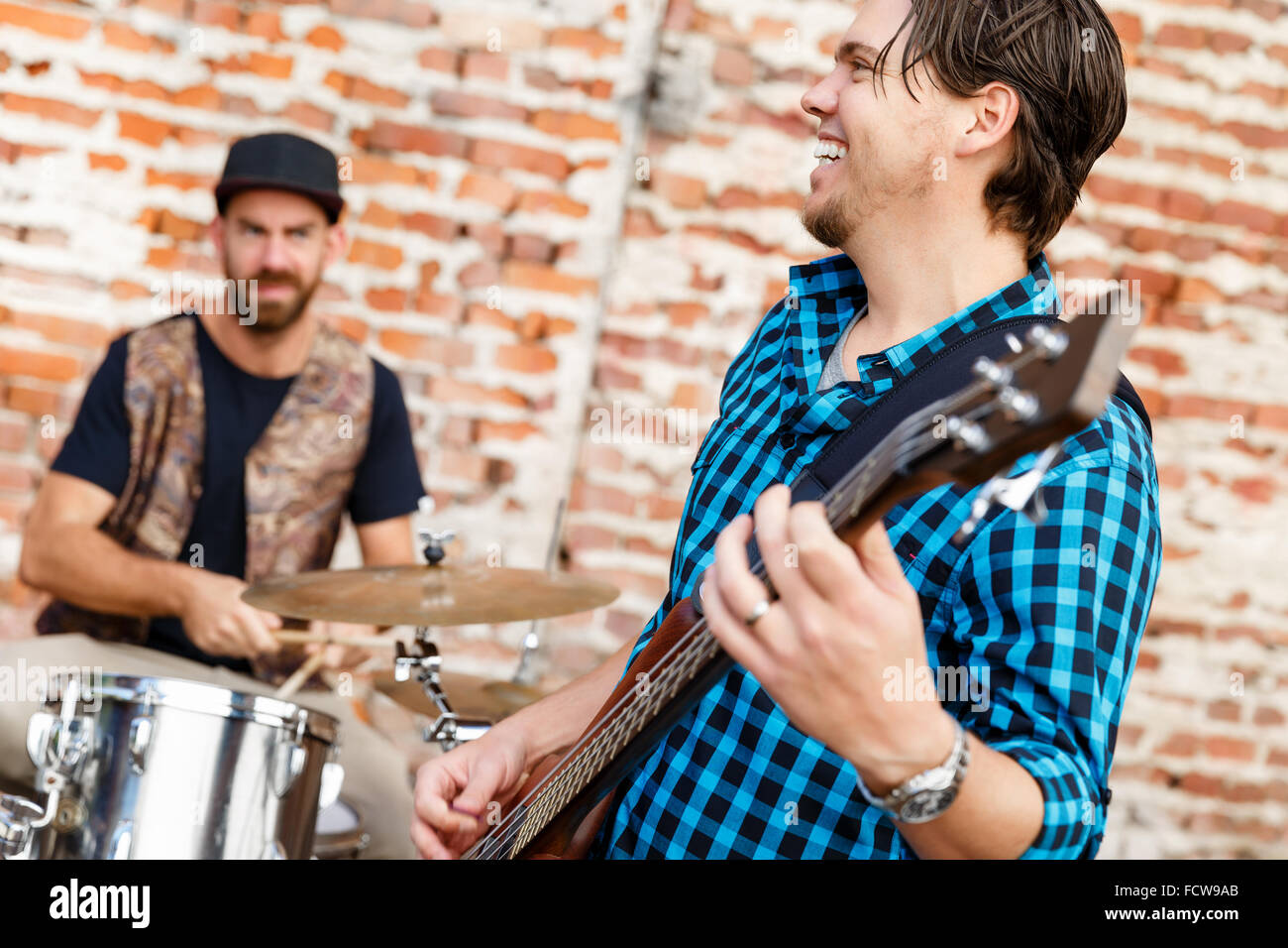 Band of musicians playing in the street Stock Photo - Alamy