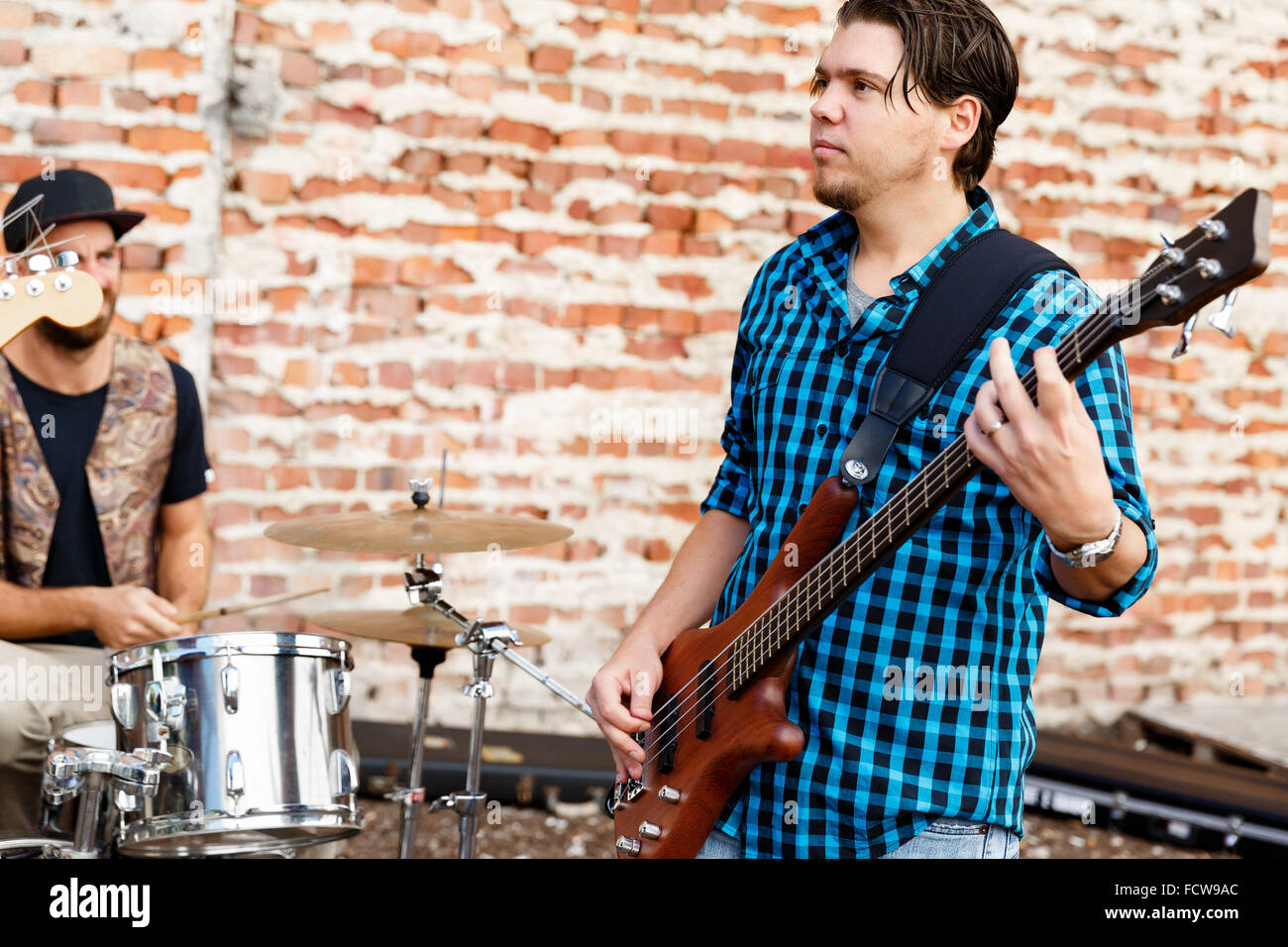 Band of musicians playing in the street Stock Photo - Alamy