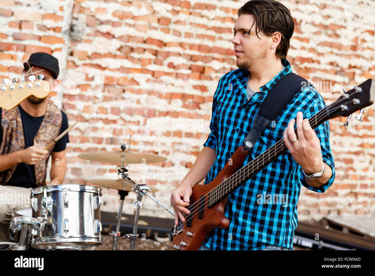 Band of musicians playing in the street Stock Photo - Alamy