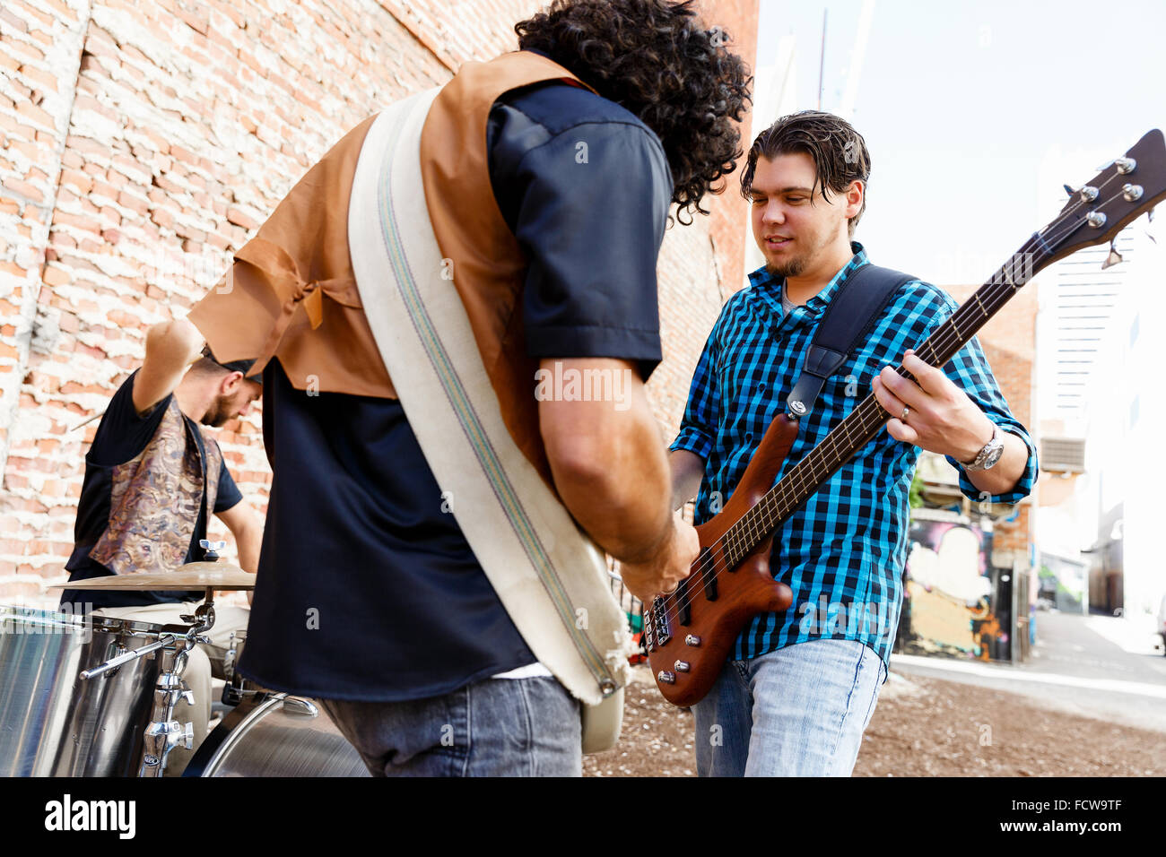 Band of musicians playing in the street Stock Photo - Alamy