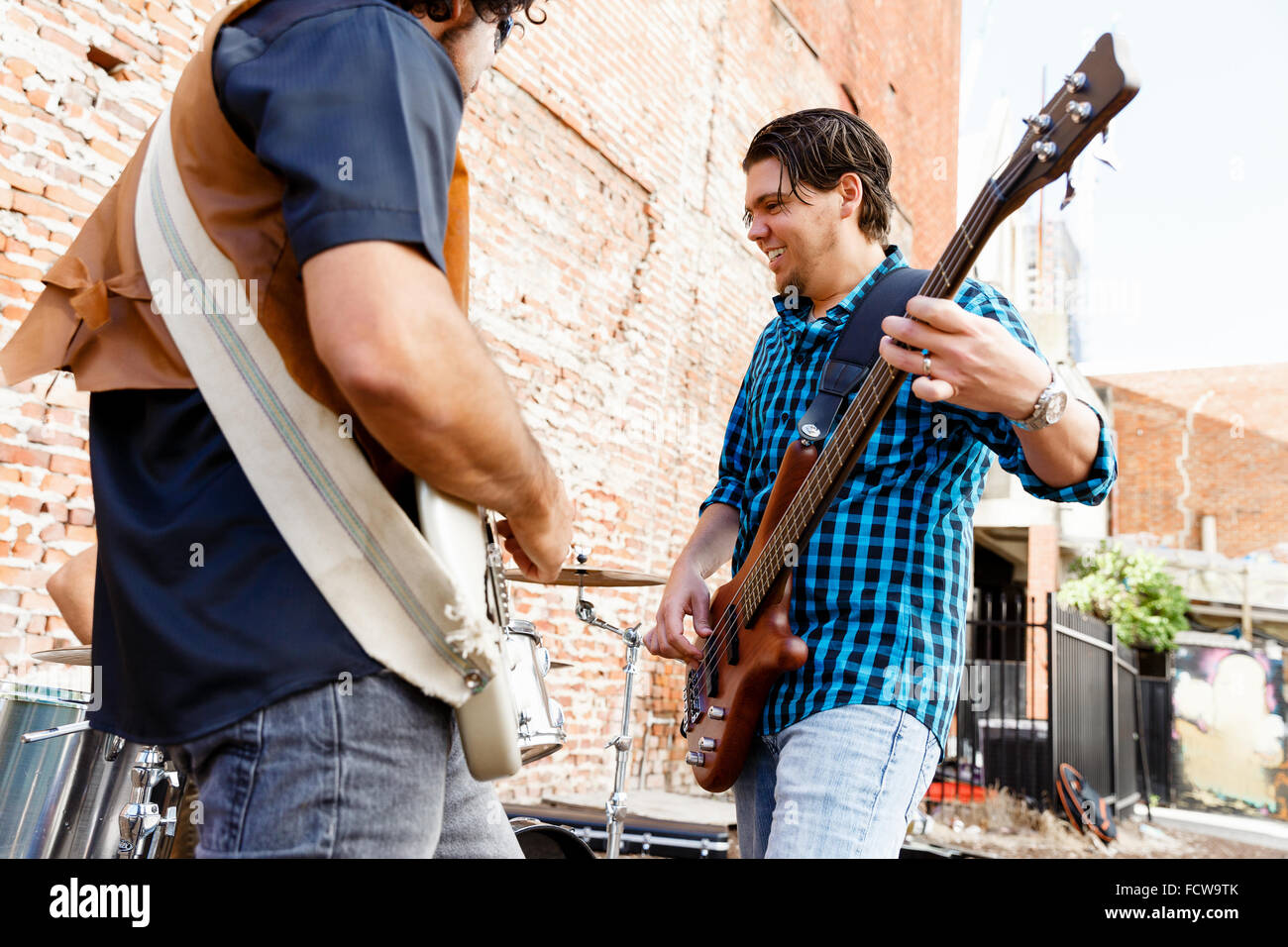 Band of musicians playing in the street Stock Photo - Alamy