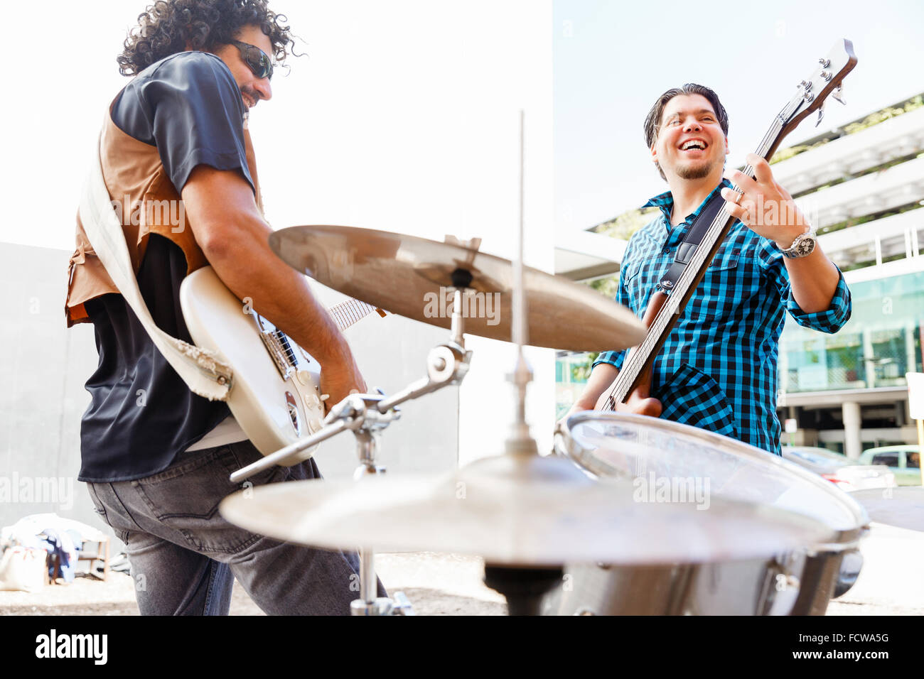 Band of musicians playing in the street Stock Photo - Alamy