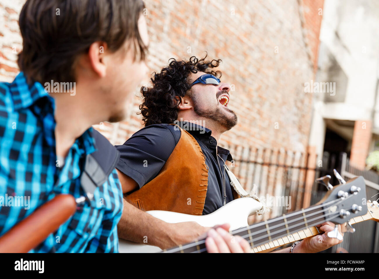Band of musicians playing in the street Stock Photo - Alamy