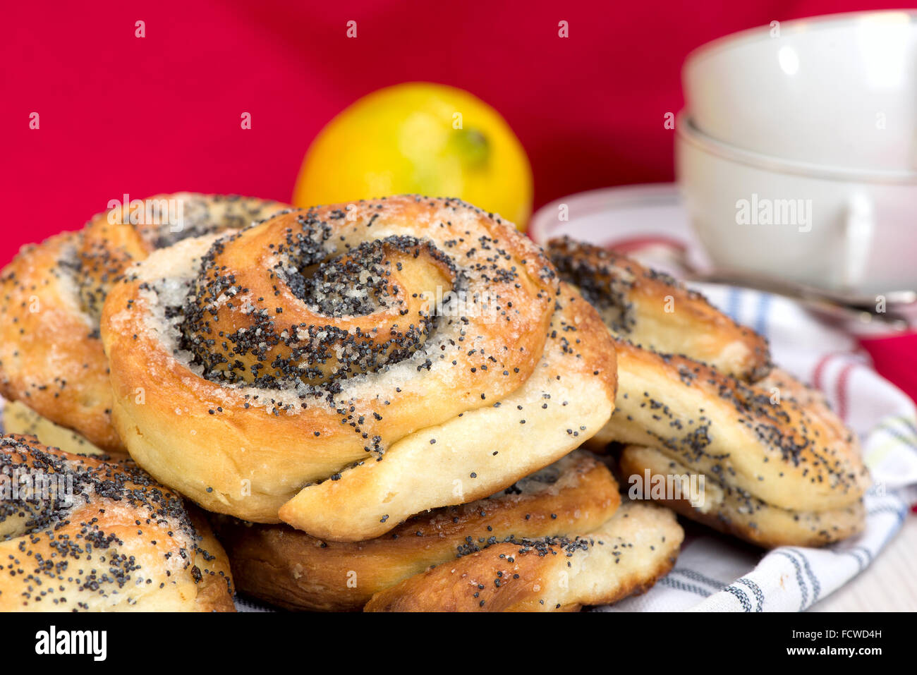 sweet bun with poppy seeds for tea Stock Photo - Alamy