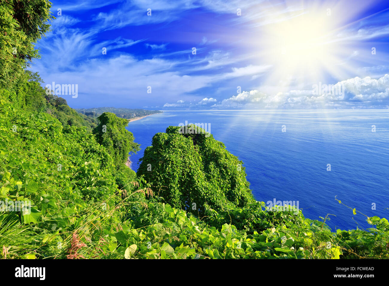 Beautiful view of the green island, sea and blue sky Stock Photo - Alamy