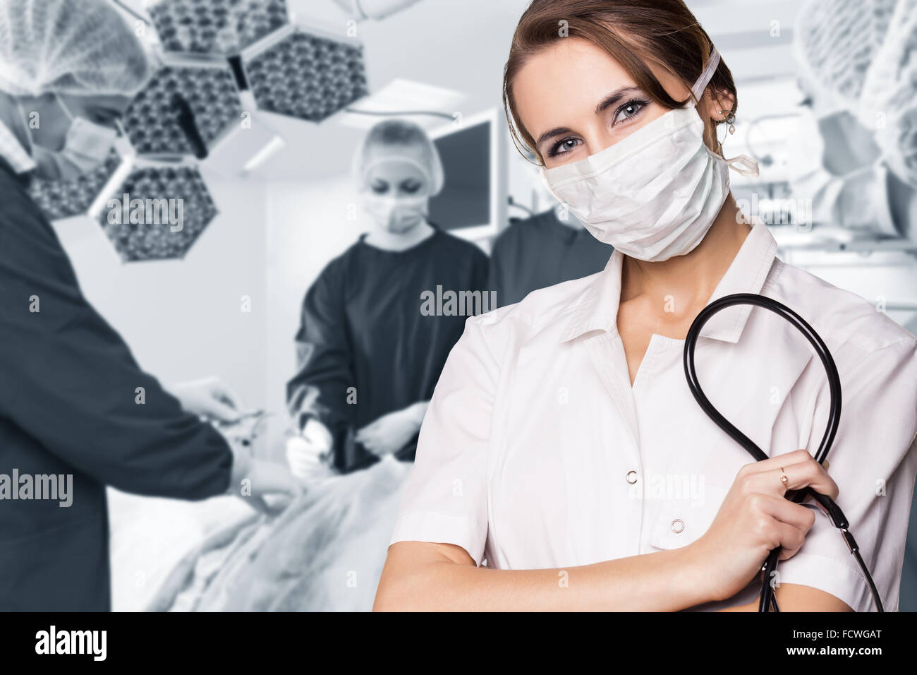 Surgery team operating in a surgical room Stock Photo - Alamy