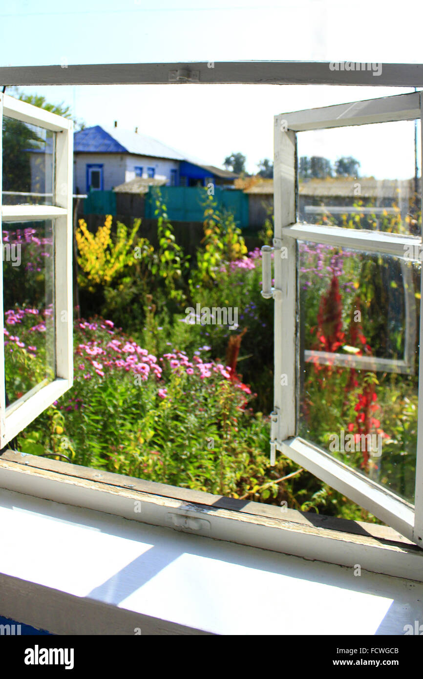 opened window to the summer garden in the village Stock Photo - Alamy