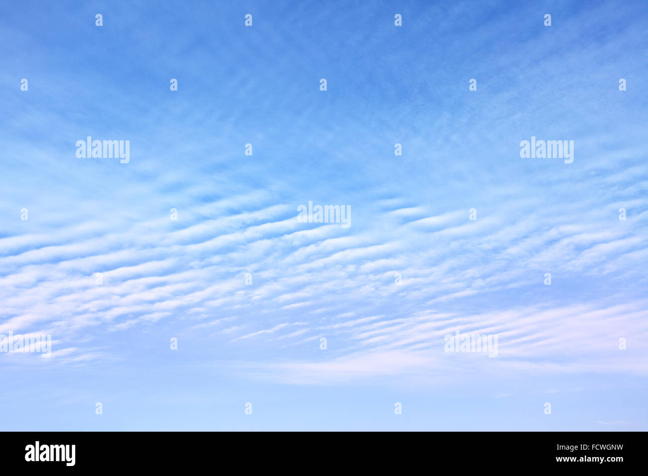 Sky with wavy clouds, may be used as background Stock Photo - Alamy