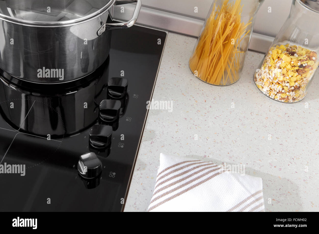 Part of a modern kitchen, electric stove details with drawers Stock ...