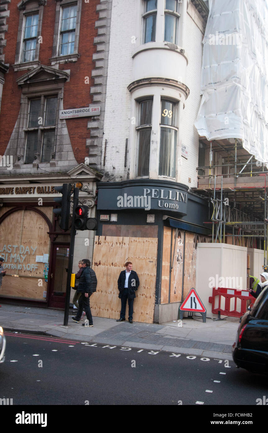 London, UK, 25 January 2016, Security stand guard outside the boarded ...