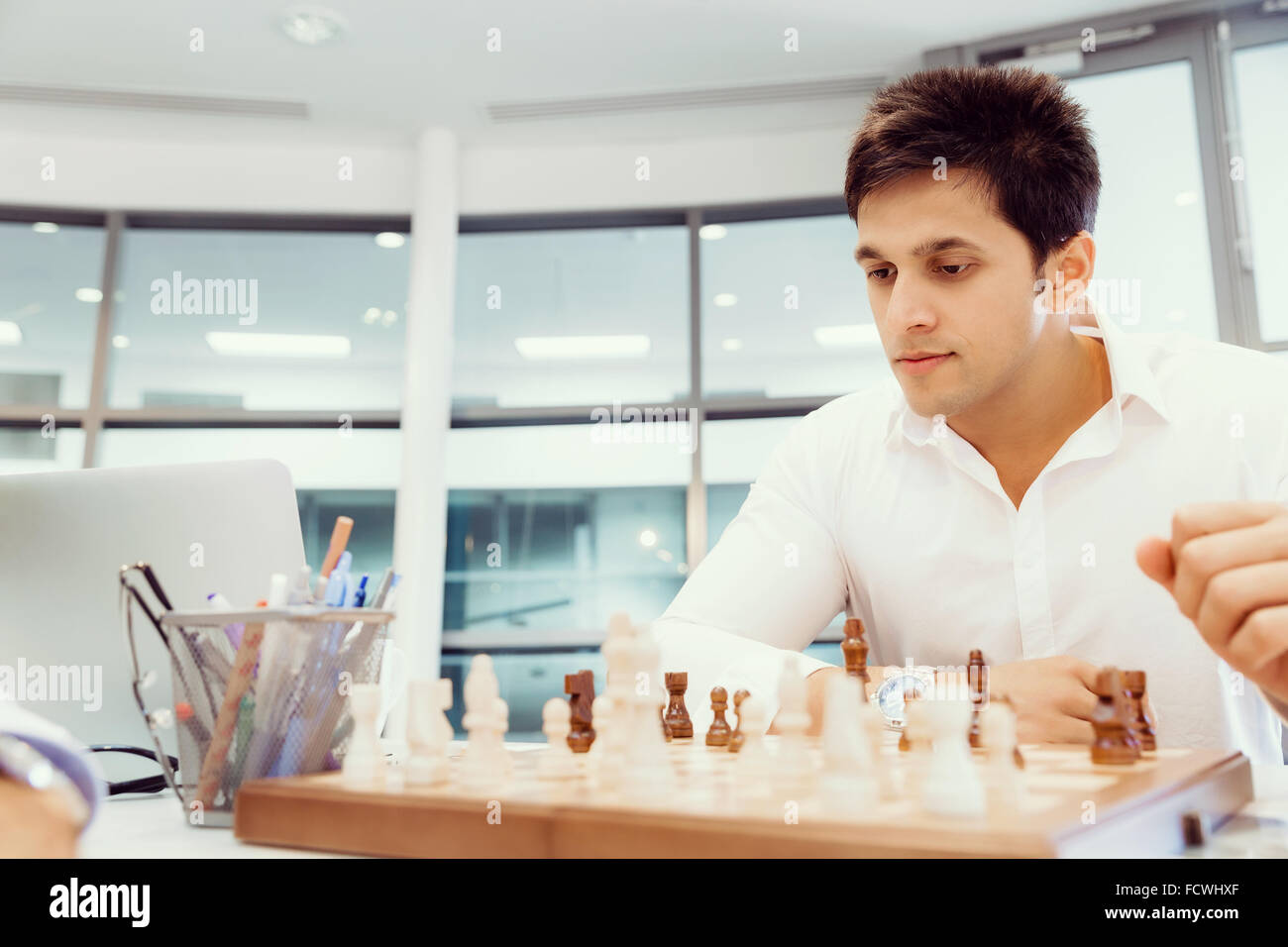 Two business partners play table hi-res stock photography and images ...