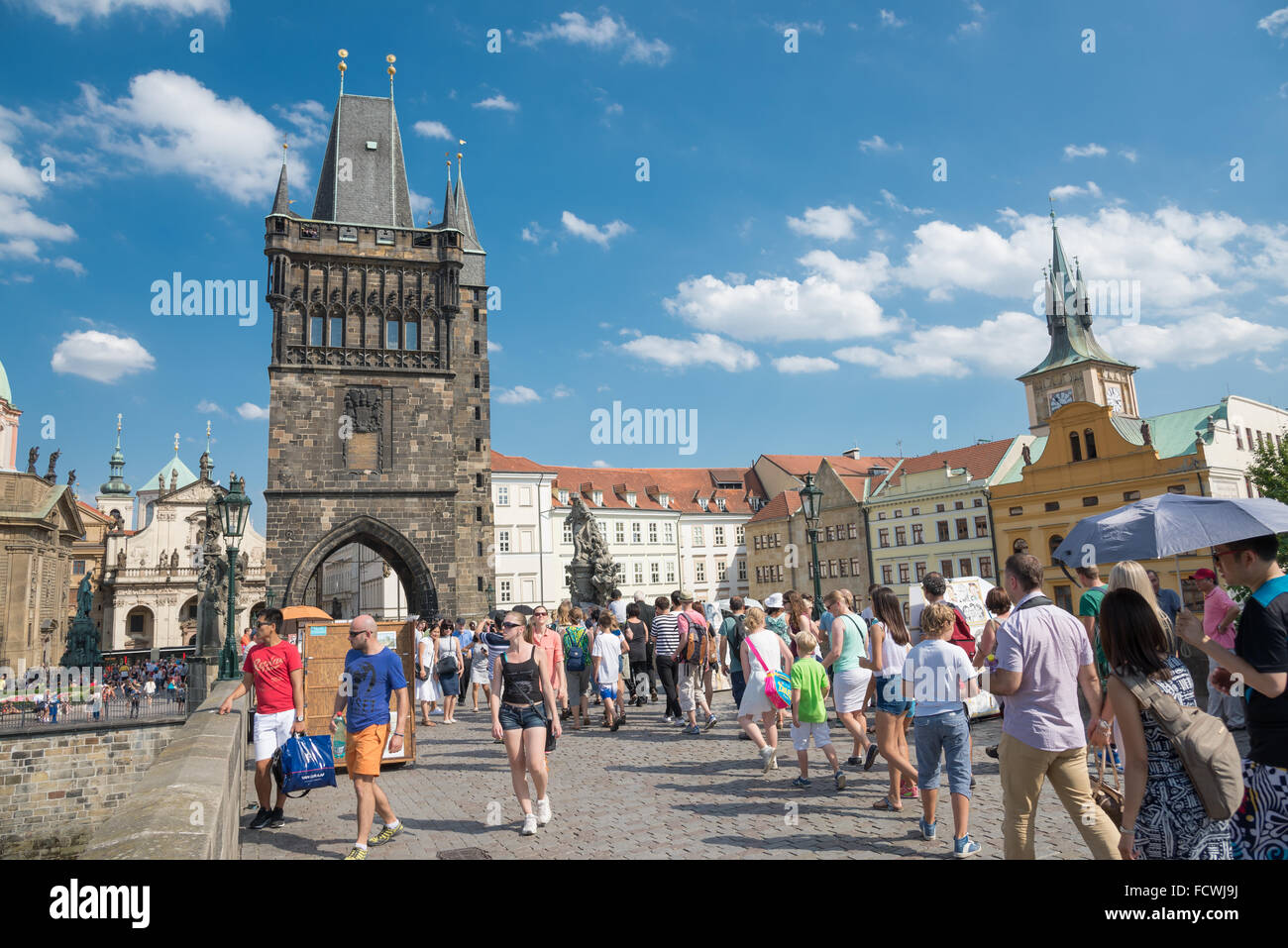 PRAGUE - AUGUST 5: People walking on the famous Charles Bridge ...