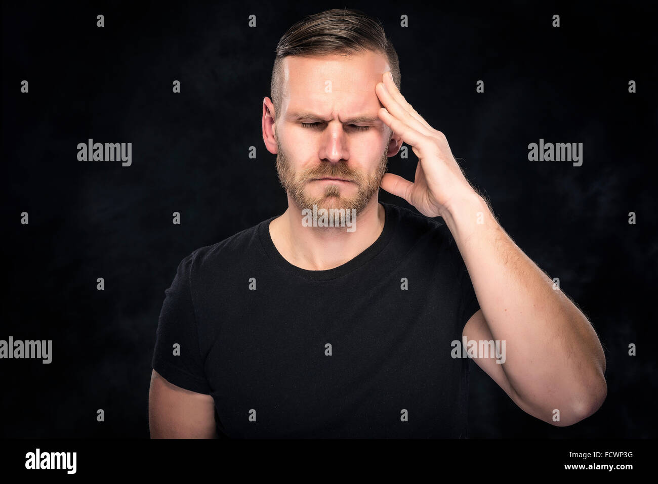 Headache in men Stock Photo - Alamy