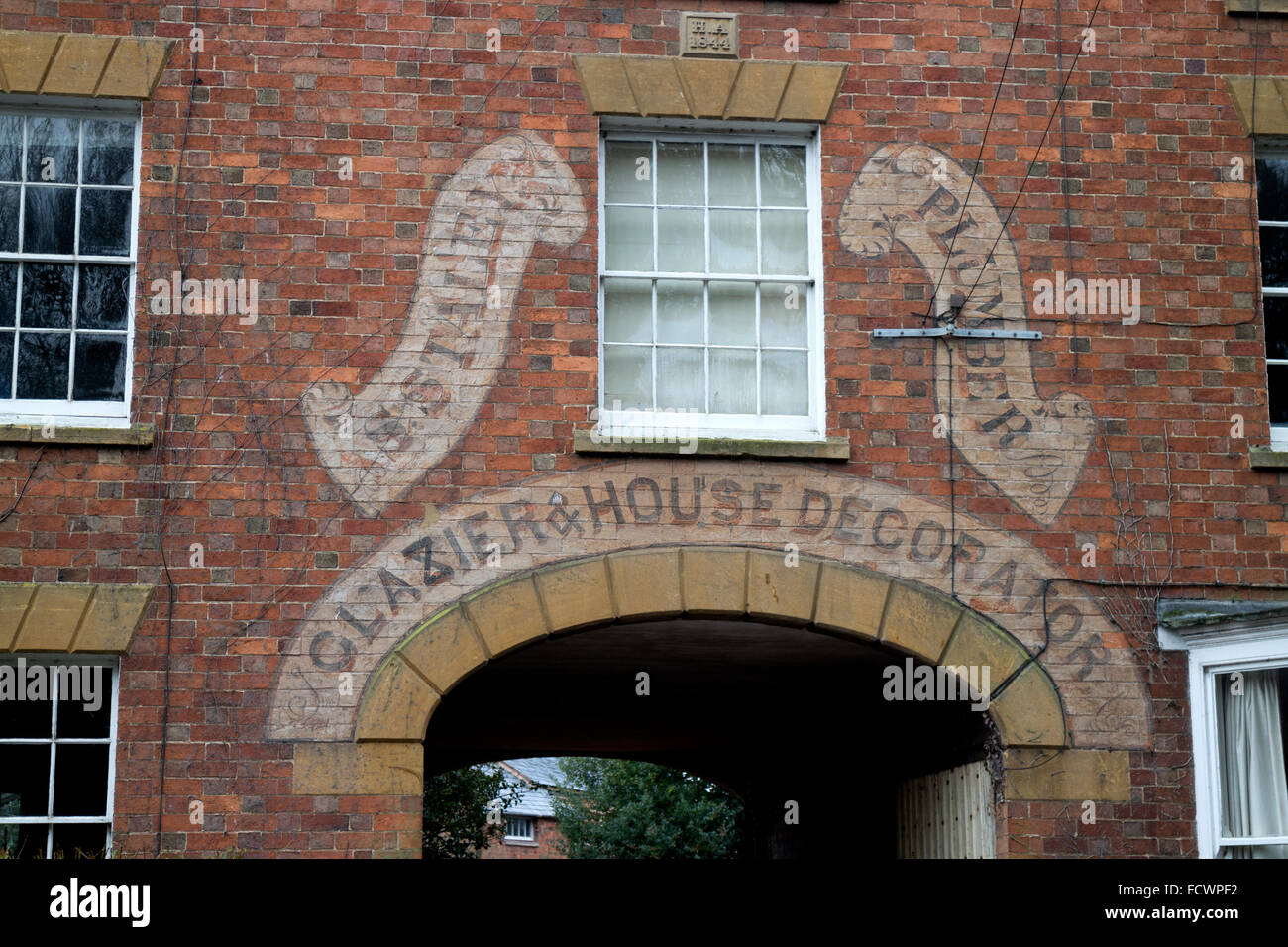 Old painted signs on building hi-res stock photography and images - Alamy